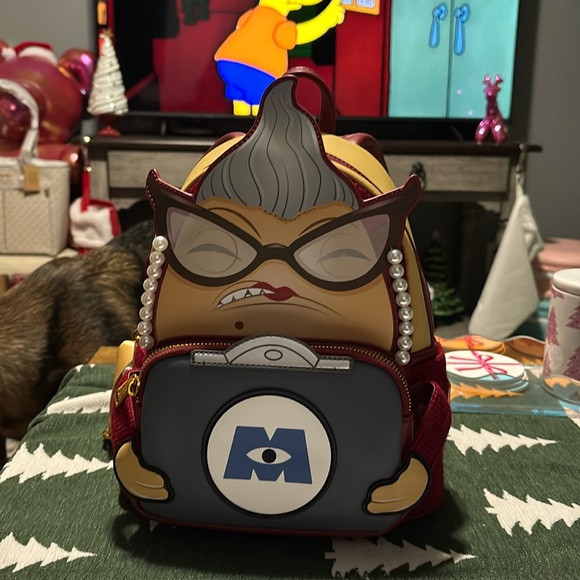 Loungefly | Bags | Loungefly Disney Pixar Backpack Monsters Inc Roz ...